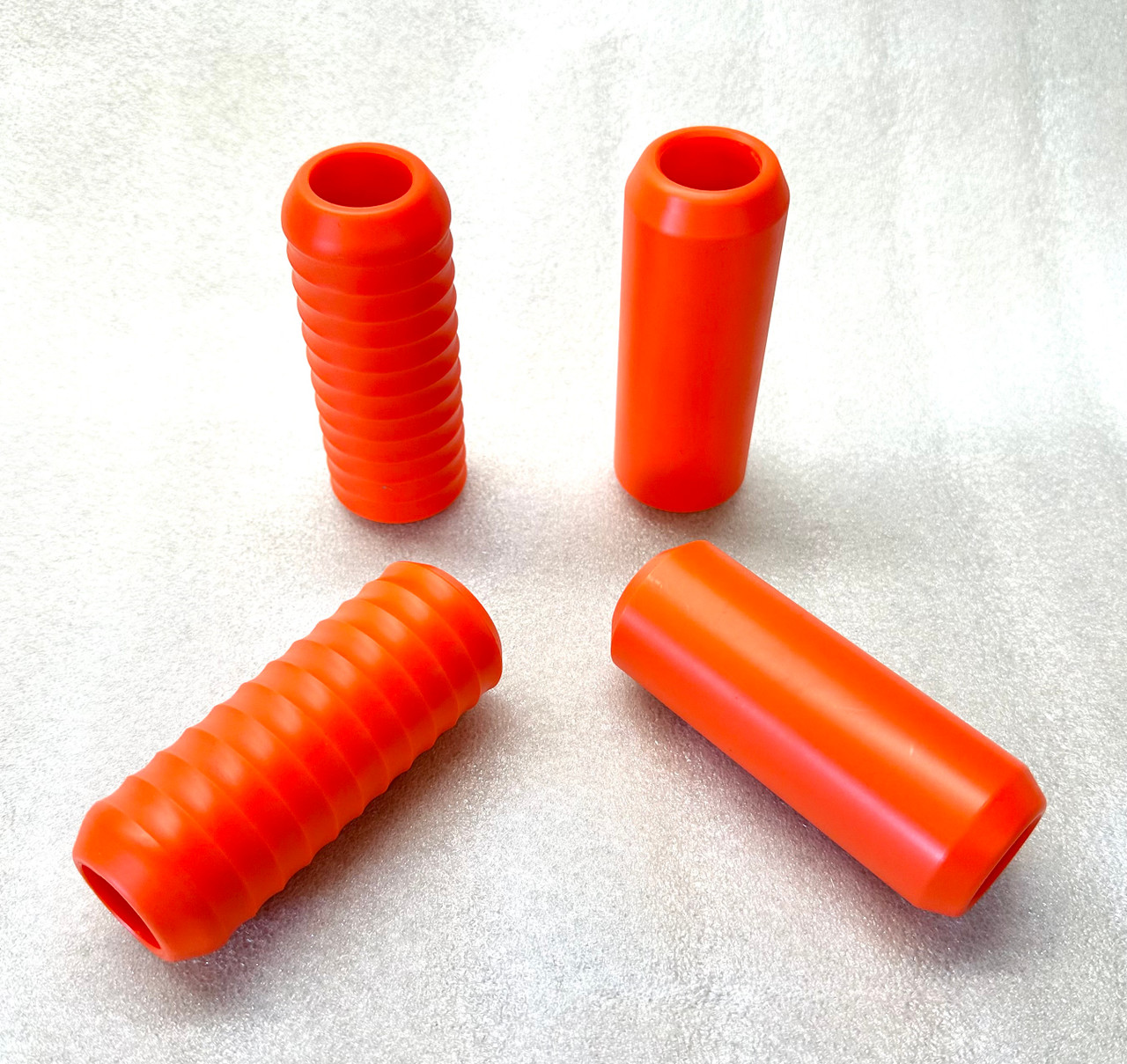Orange Delrin Shock and Passenger Peg Slider - Bung King Manufacturing Inc.