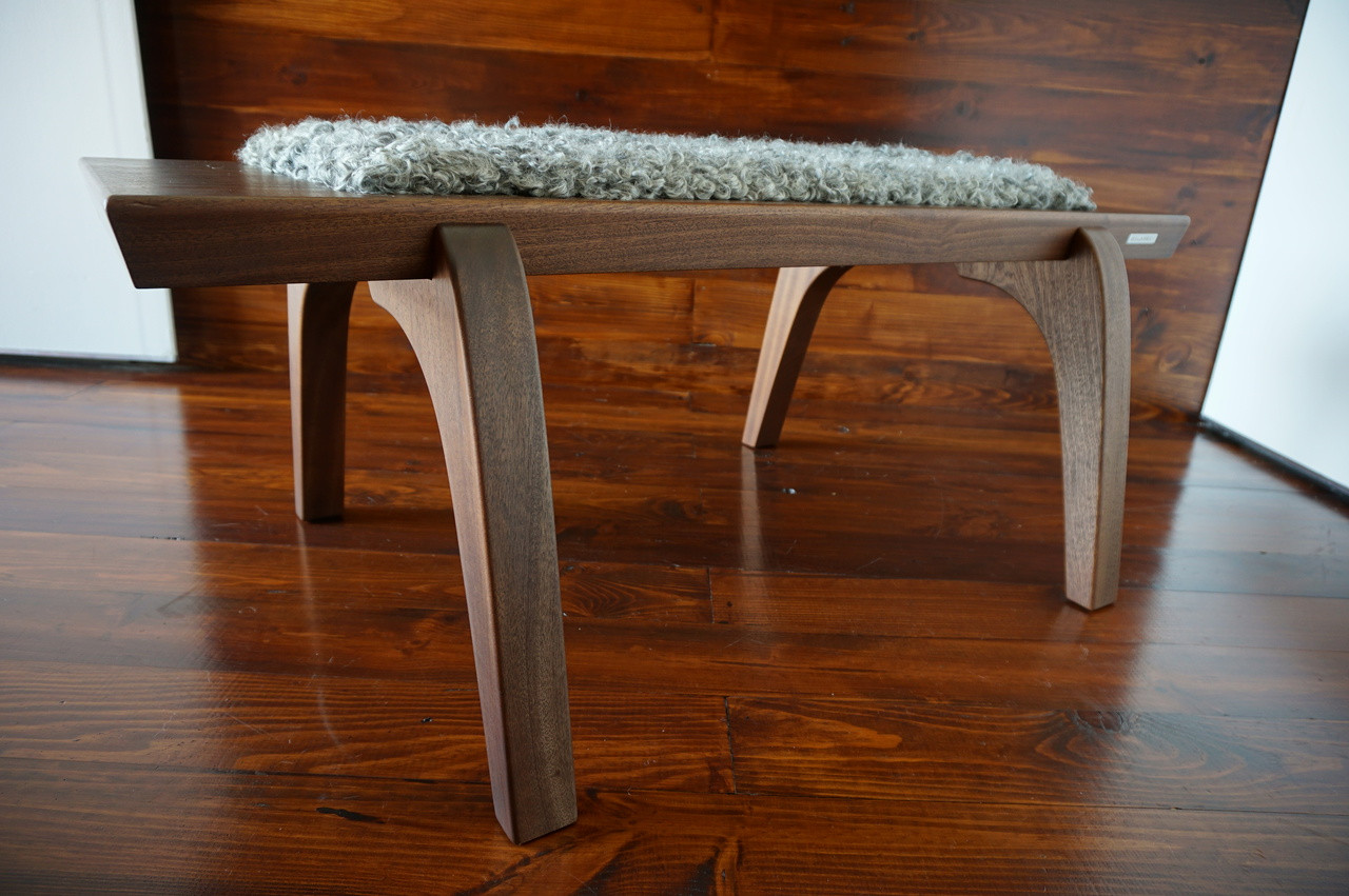 Minimalist Mahogany wood bench Upholstered with curly silver ...