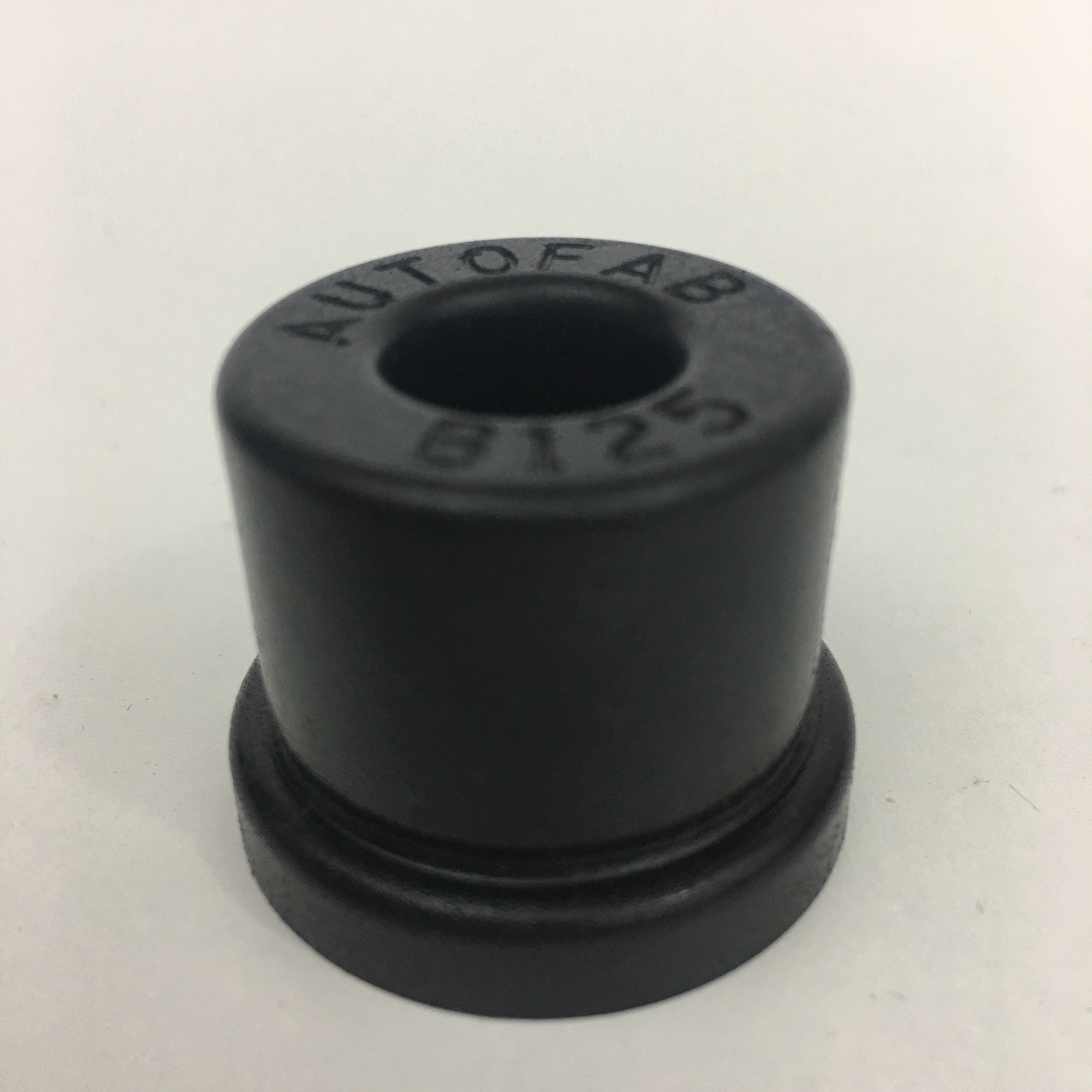 Black Autofab urethane bushing for 1.25" x .095 with a 1/2"" hole ...