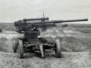 aa576 - destroyed Soviet FLAK in battlefield - GermanDotMilitaria