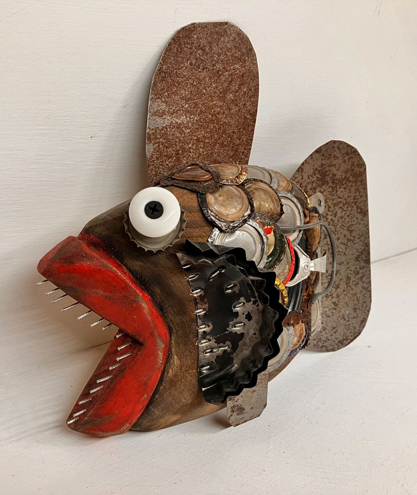 WOOD CARVED FISH covered with found objects by Steve Meadows