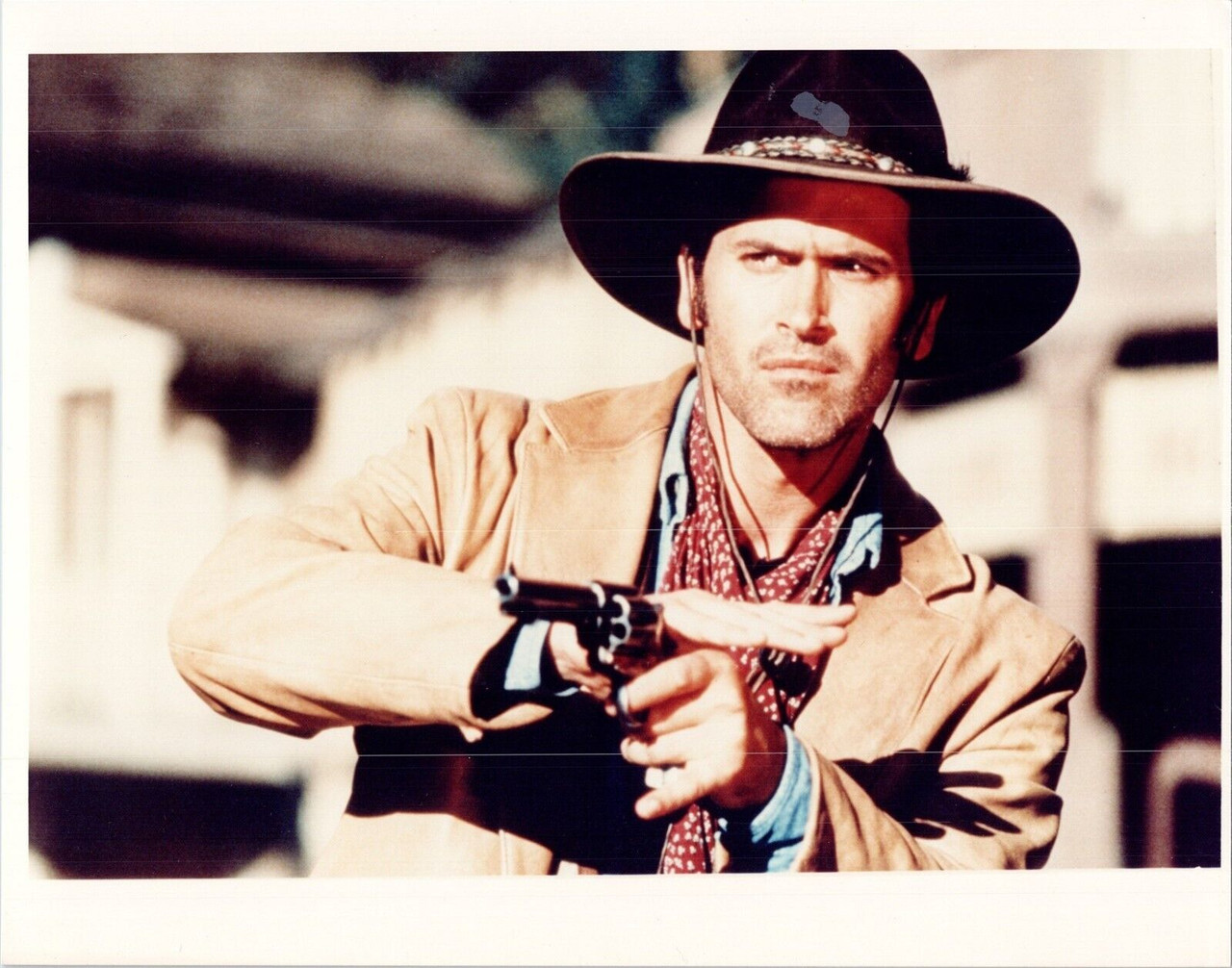 Bruce Campbell takes aim with pistol Adventures of Brisco County Jr ...