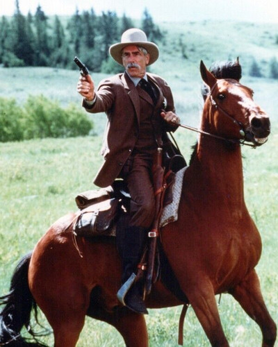 Sam Elliott in suit on horseback ready for gun action 8x10 inch photo ...