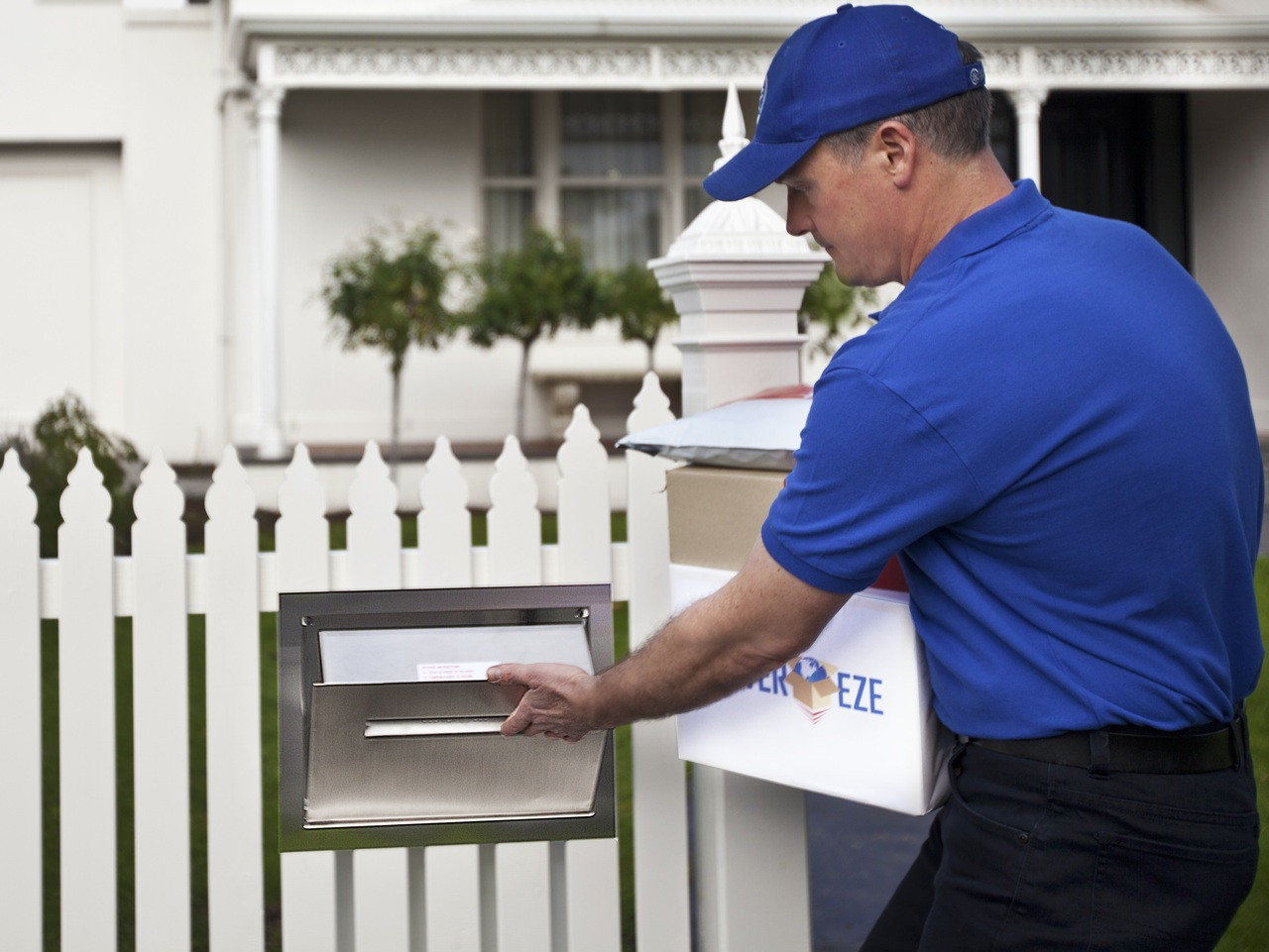 Fence mounted letterbox for secure parcel delivery | Deliver-Eze