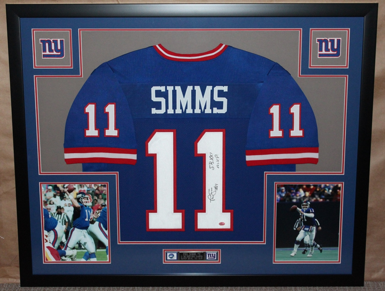 Phil Simms Autographed SB XXI MVP and Framed Blue Giants Jersey